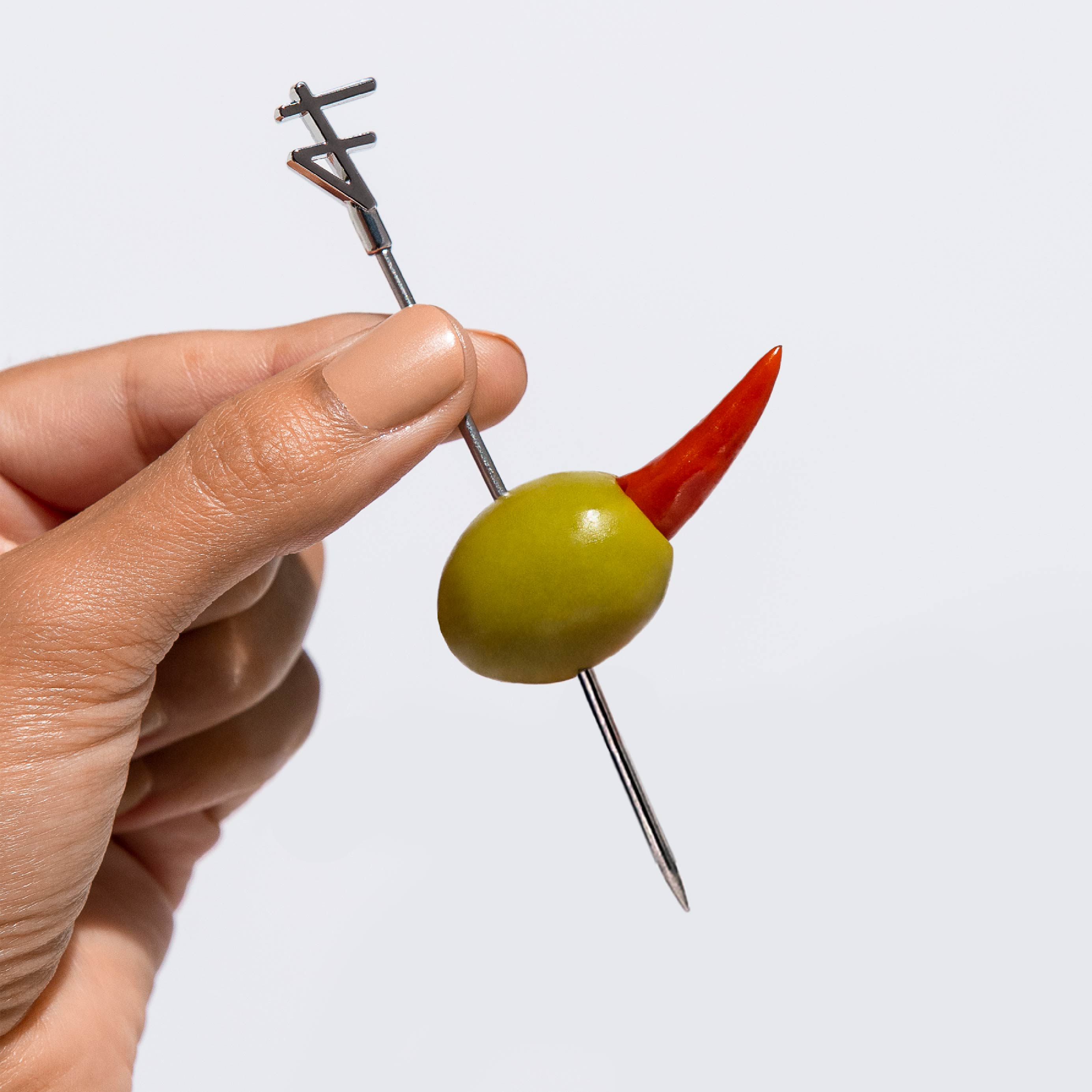 Filthy Pepper Stuffed Olives - Premium cocktail garnishes.