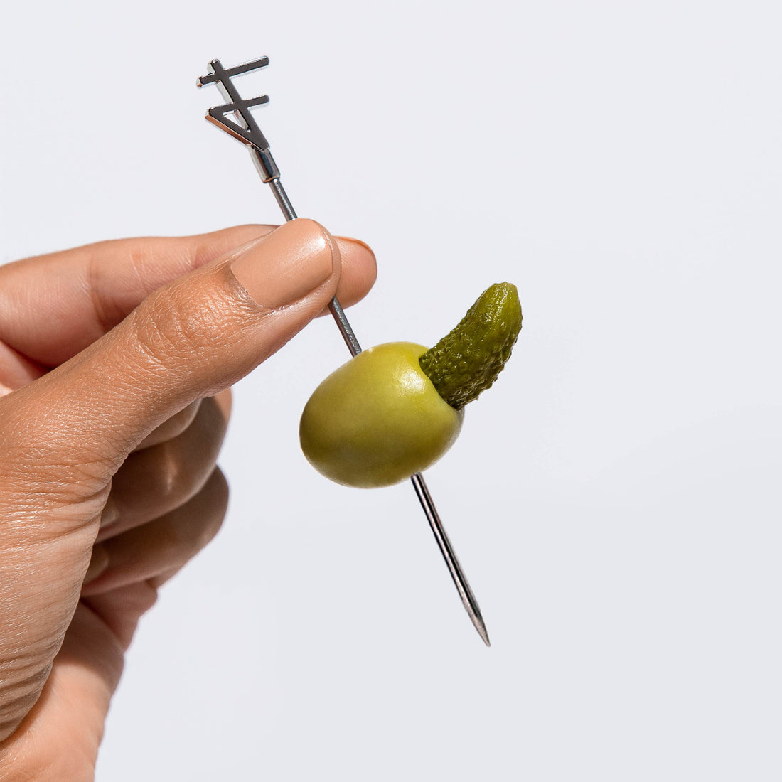 Filthy Pickle Stuffed Olives - Premium cocktail garnishes.